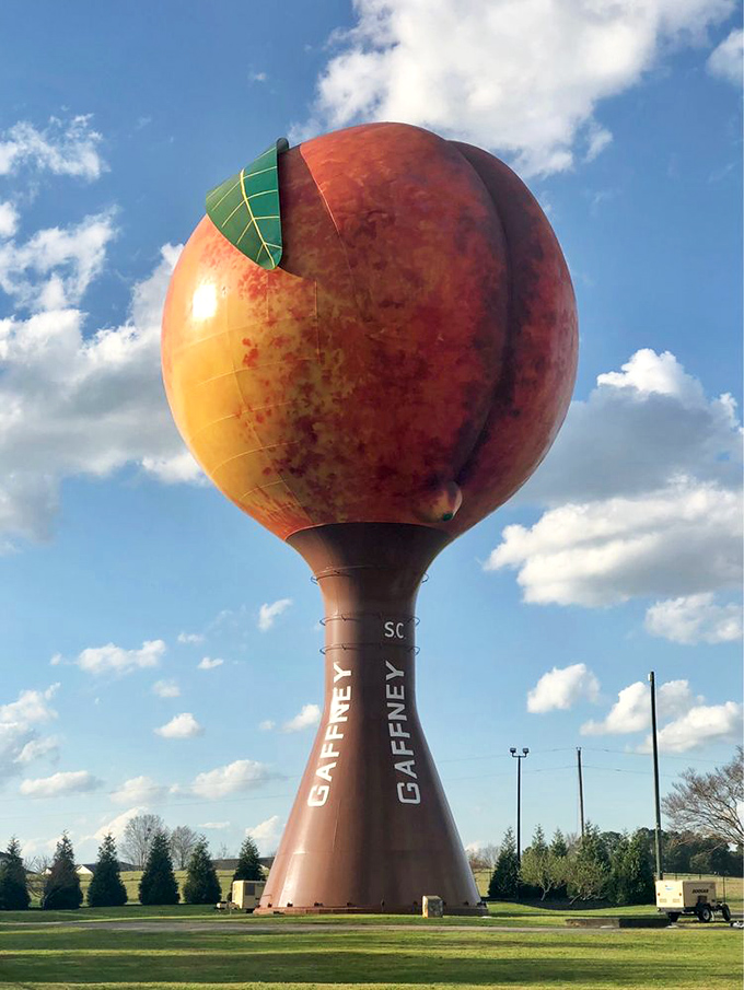 Clouds drift lazily behind the Peachoid, as if Mother Nature herself is stopping to admire South Carolina's most voluptuous roadside attraction.