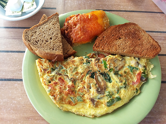 An omelet that somehow manages to make vegetables feel indulgent. Proof that "eating your greens" and "treating yourself" aren't mutually exclusive concepts.