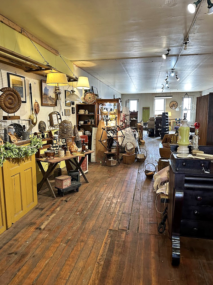 The yellow wall adds sunshine to this collection of everyday artifacts that once defined someone's idea of home—now waiting for yours.