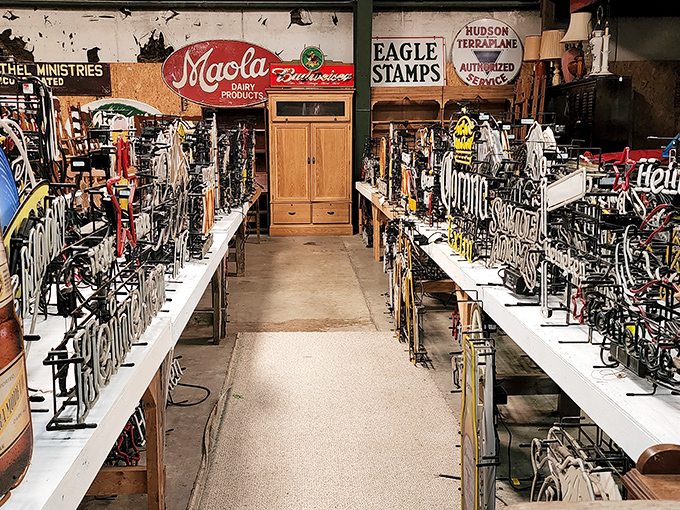 A hallway of history where every metal sign tells a story. It's like Instagram for previous generations, but with actual metal.