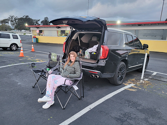 Movie-goers create their own perfect viewing experience, transforming vehicles into cozy mobile theaters for the evening.