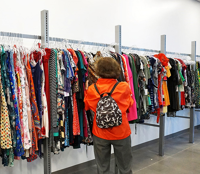 A rainbow of garments awaits exploration, where patient shoppers might discover everything from last season's mall brands to vintage treasures.