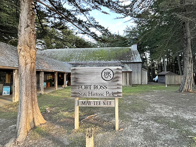 "MAY-TEE-NEE" welcomes visitors to Fort Ross's rustic visitor center, where California's Russian chapter begins to unfold beneath towering redwoods.