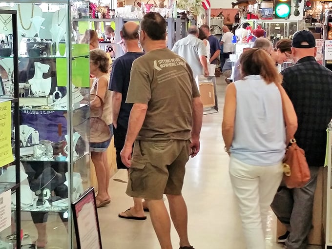 The true measure of a great antique mall? The crowd it draws. Serious collectors and curious browsers alike navigate these aisles like archaeologists on a mission.