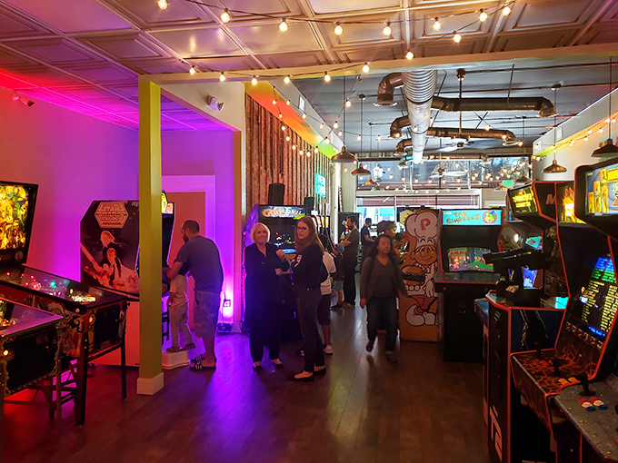 Families discovering together that some joys are timeless, as parents introduce kids to the games that once swallowed their allowances.