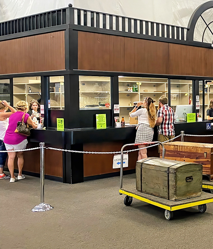 The checkout counter buzzes with activity as shoppers prepare to explain to their spouses why they absolutely needed that 1950s toaster.