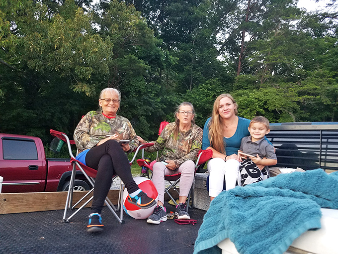 Multi-generational movie magic in the making, where tailgates become living rooms and the family SUV transforms into the world's coziest theater seating.