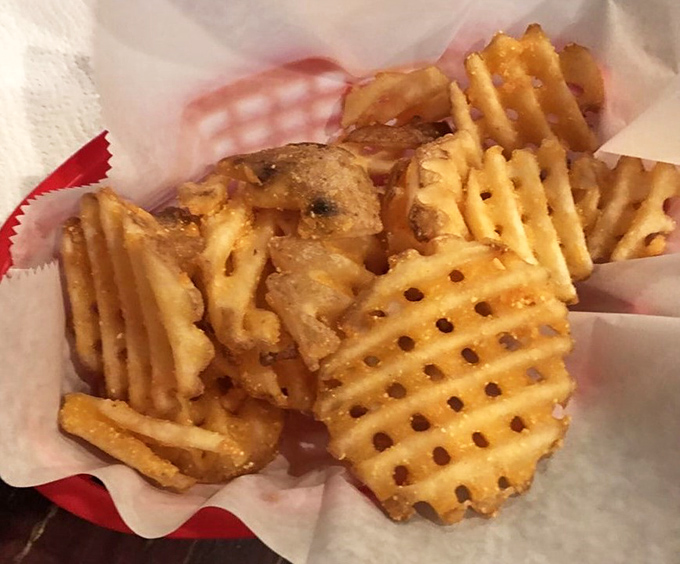 Waffle fries that crunch like autumn leaves underfoot. The perfect sidekick to any burger adventure.