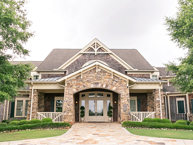 This craftsman-style clubhouse welcomes golfers and diners alike, proving that in Georgia, hospitality comes with architectural flair and a side of green views.