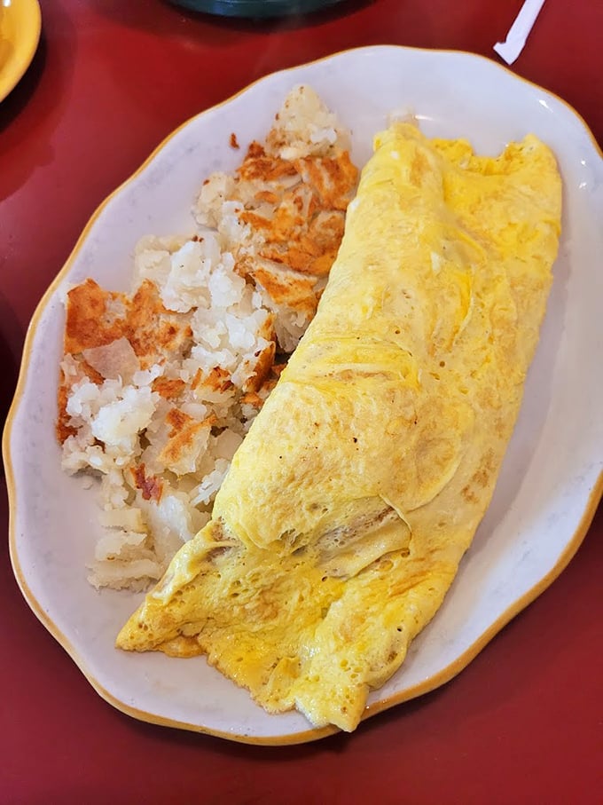 This golden omelet with perfectly crispy hash browns is the breakfast equivalent of hitting the lottery on a Tuesday morning.