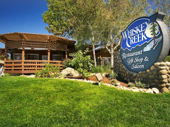 Whiskey Creek's rustic exterior promises the kind of comfort food that makes you want to loosen your belt before you even sit down.