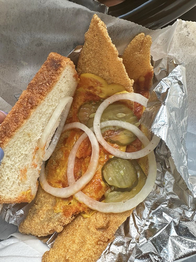The legendary whiting sandwich in all its glory&mdash;crispy fish, soft bread, and that perfect combination of mustard, pickles, and onions that changes lives.