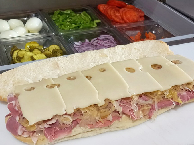 Behold the art of sandwich construction &ndash; ham and cheese layered with mathematical precision that would make your high school geometry teacher weep with joy.
