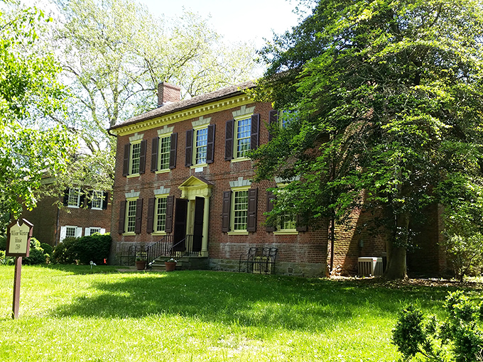 The Wilson-Warner House basks in spring sunshine, its brick fa&ccedil;ade and perfect symmetry showcasing Georgian architectural precision that would make Thomas Jefferson nod approvingly.