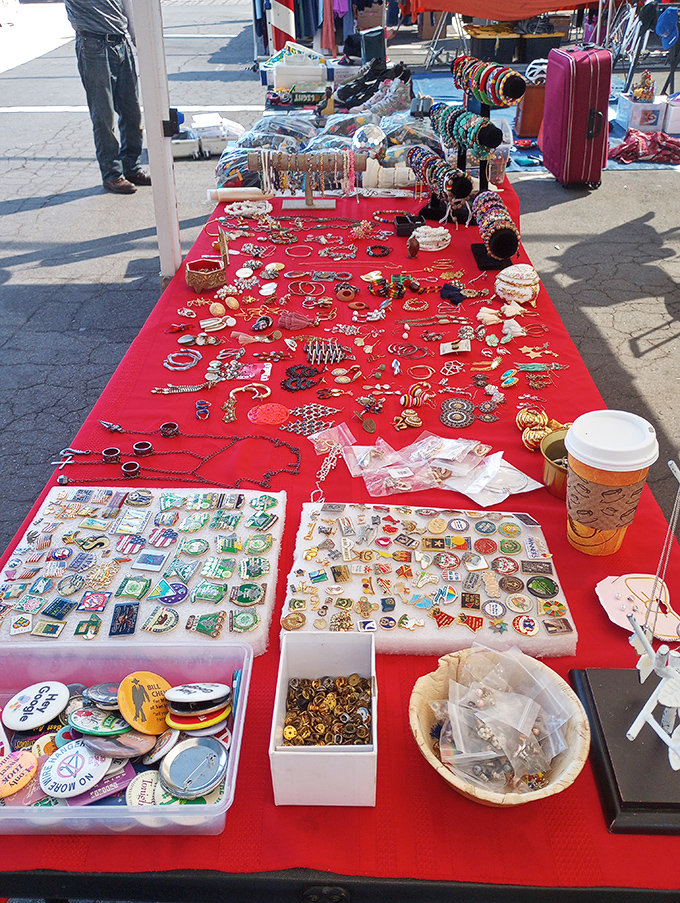 Jewelry hunters, prepare to lose track of time. This red tablecloth display showcases everything from vintage pins to modern bangles in dazzling abundance.