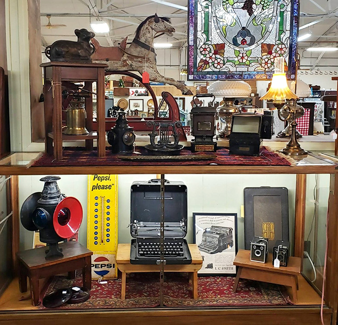 A typewriter sits ready to compose love letters while cameras capture memories never taken.