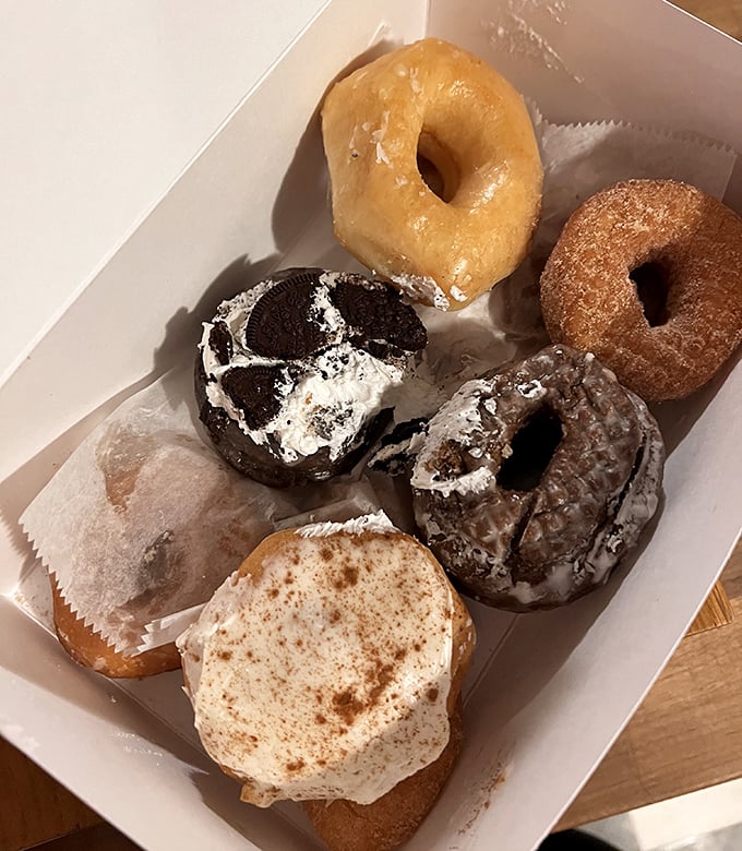 The hardest decision you'll make today: which donut makes the cut? The white box becomes a gallery of edible art.