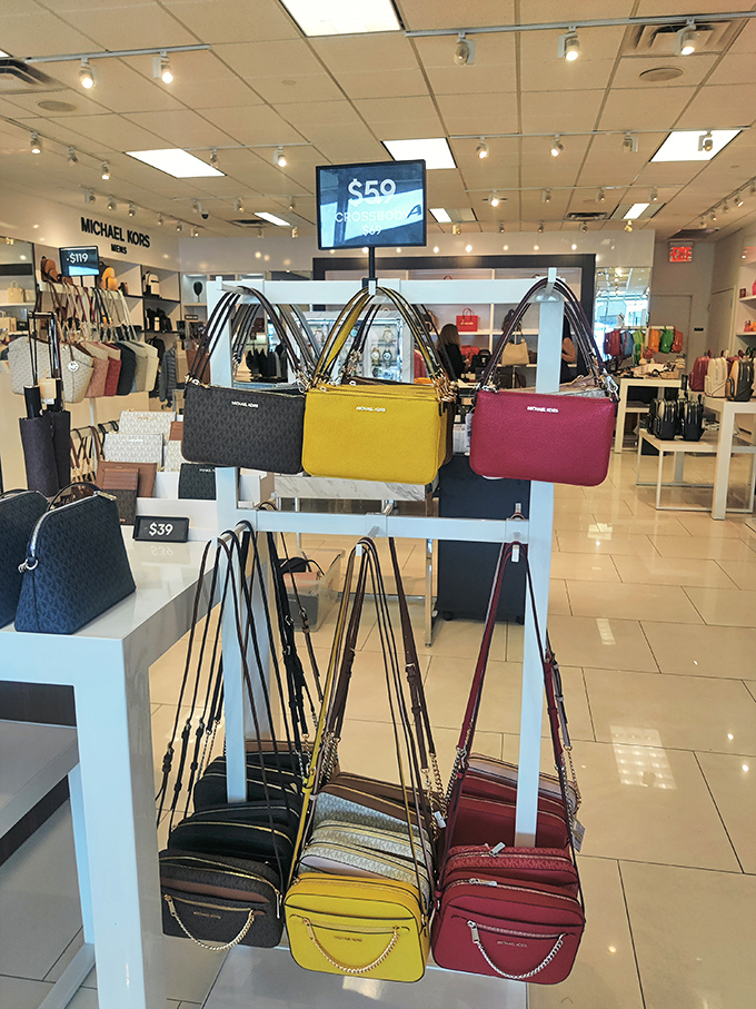 Michael Kors handbags displayed like colorful candy&mdash;suddenly that $50 in your pocket feels like it has magical powers. 