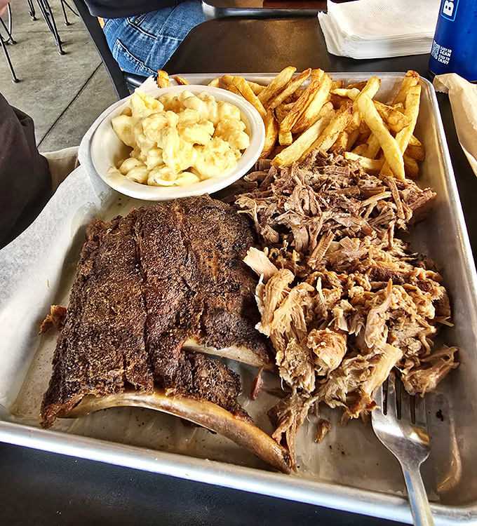 BBQ perfection doesn't happen by accident. This tray of smoky goodness comes with mac and cheese that could make a southerner weep.