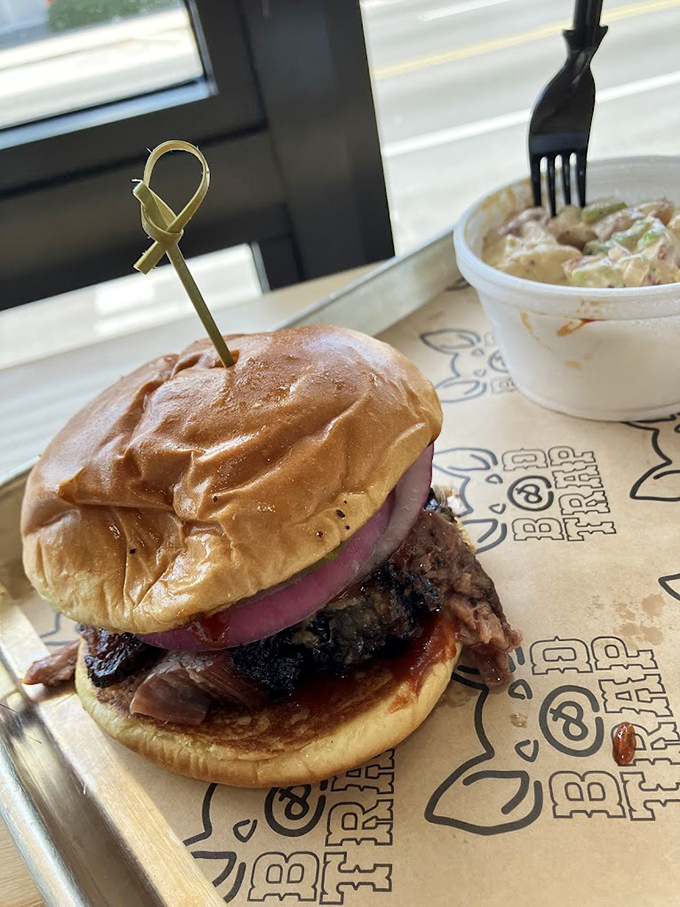 Architecture matters in sandwiches too. This brisket masterpiece demonstrates perfect structural integrity while threatening to collapse under its own deliciousness.