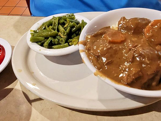 These beef tips and gravy could make a vegetarian question their life choices. The green beans aren't just a side&mdash;they're swimming in flavor all their own.