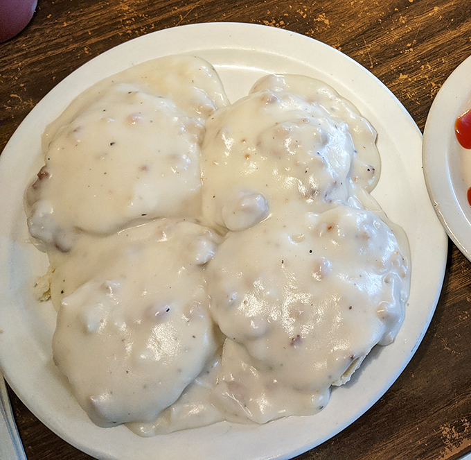 Behold the holy grail of Hoosier breakfasts&mdash;biscuits smothered in creamy sausage gravy. Not diet food, but worth every glorious calorie.