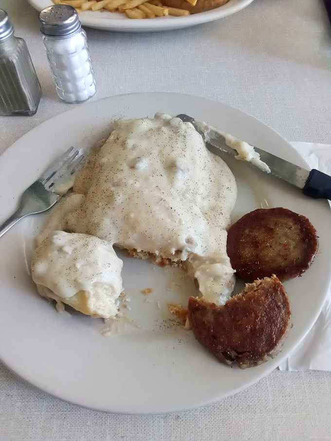 Biscuits and gravy—the Southern breakfast of champions. This plate doesn't need fancy garnishes when the gravy is this peppery and the sausage patties this perfectly browned.