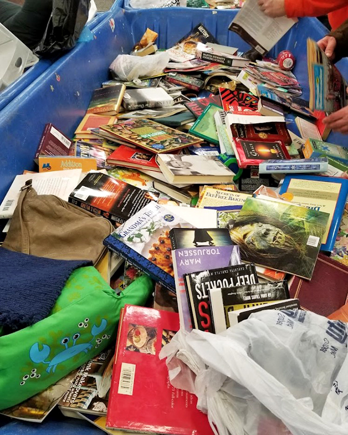 Literary jackpot! From bestsellers to cookbooks, these blue bins hold countless stories waiting for second chances and new bookshelves.