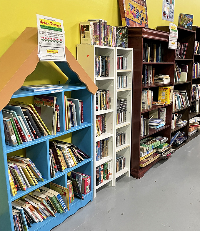 A house-shaped bookshelf holding actual house-shaped knowledge &ndash; it's like inception for readers on a budget.