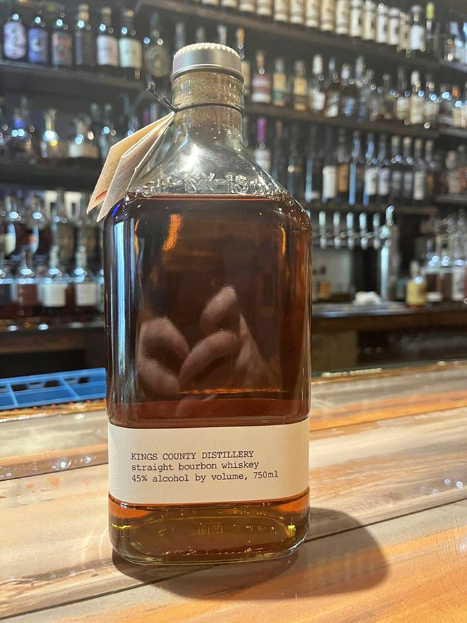 The well-stocked bar doesn't just promise good times—it delivers them in bottles, glasses, and conversation that flows as smoothly as their premium bourbon.