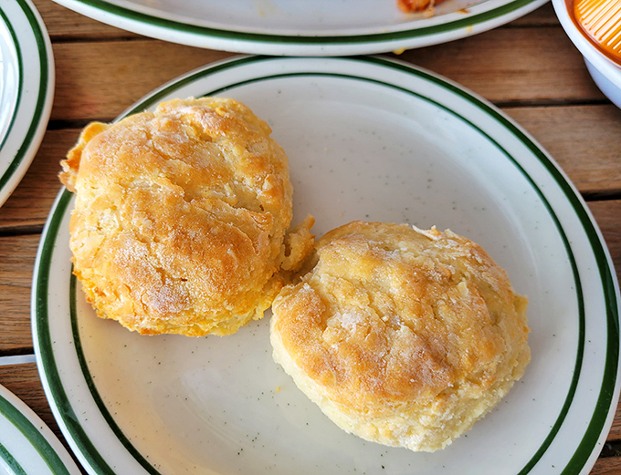 Golden-topped buttermilk biscuits that would make your grandmother both proud and slightly jealous. Flaky, buttery perfection awaits.