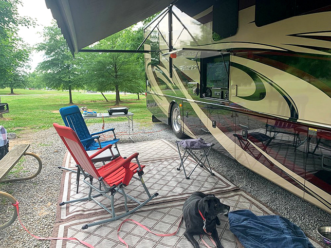 RV living at its most picturesque. When your morning commute involves walking from your camper to that perfect lakeside chair.