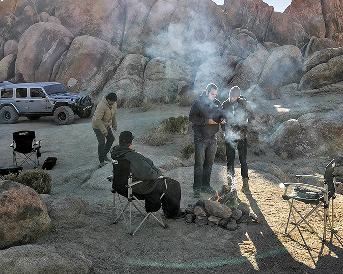 Campfire tales just hit different when your backdrop looks like it could be hiding Batman or a band of outlaws.