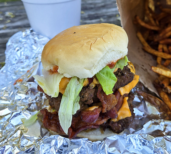 Behold the architectural marvel that is a proper Ohio burger&mdash;layers of beef, bacon, and cheese creating a savory skyscraper that demands both hands and commitment.
