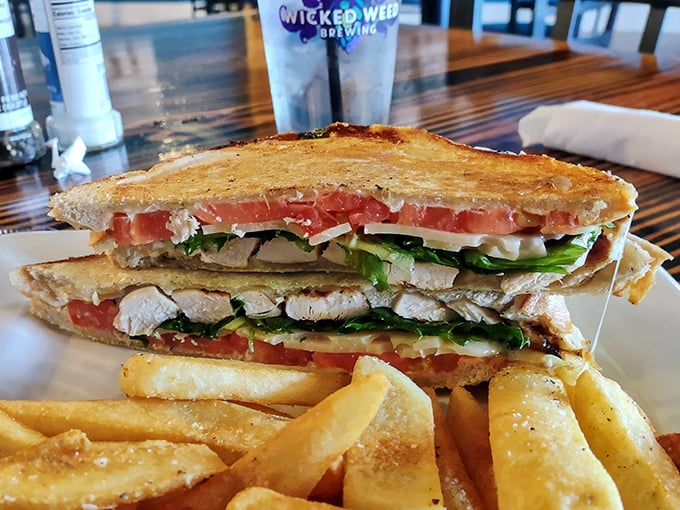 The chicken sandwich isn't just a sandwich &ndash; it's architecture with purpose. Layers of flavor stacked between golden bread with crispy fries standing guard.