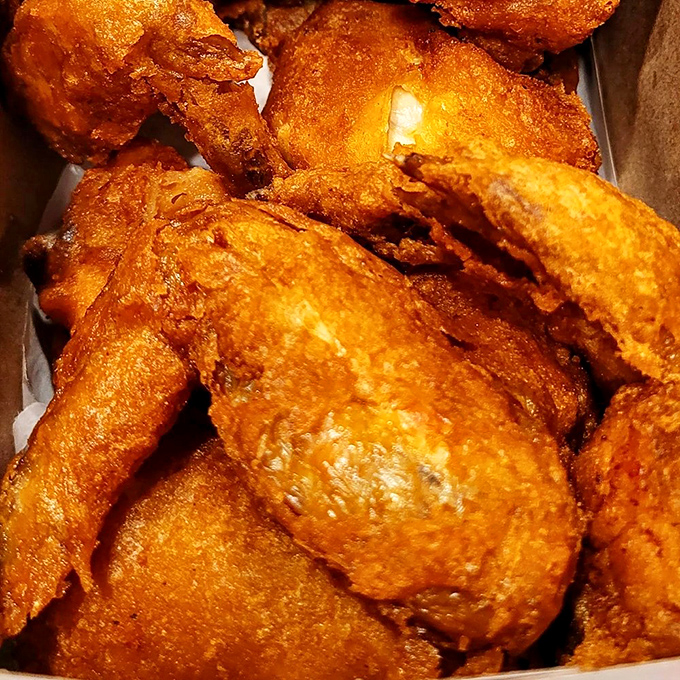 A box of crispy wings that could make even the most dignified person lick their fingers. Resistance is futile against this golden treasure.