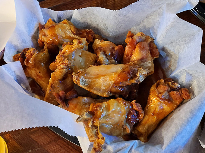 Wing perfection isn't just about sauce&mdash;it's about that perfect crispy-yet-juicy balance. These golden beauties aren't just food; they're a religious experience with napkins.