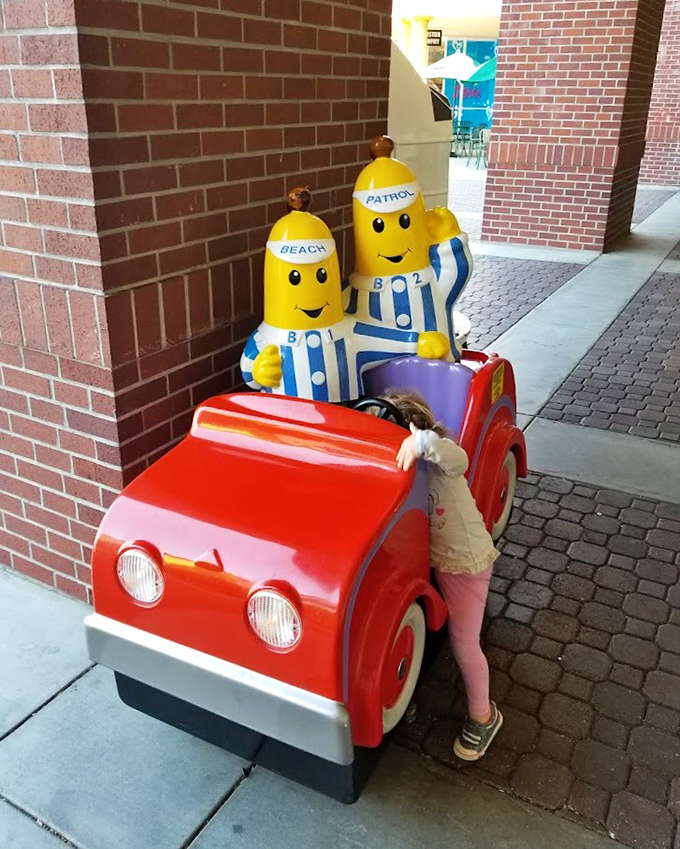 Banana-shaped characters in a fire engine ride&mdash;proof that even at a shopping destination, entertainment for the little ones prevents meltdowns during marathon bargain hunts.