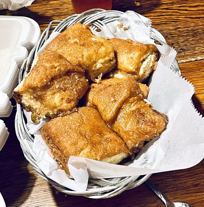 Golden, flaky cinnamon rolls arrive not as dessert but alongside your meal&mdash;a sweet tradition that's become as signature as the fried chicken itself.