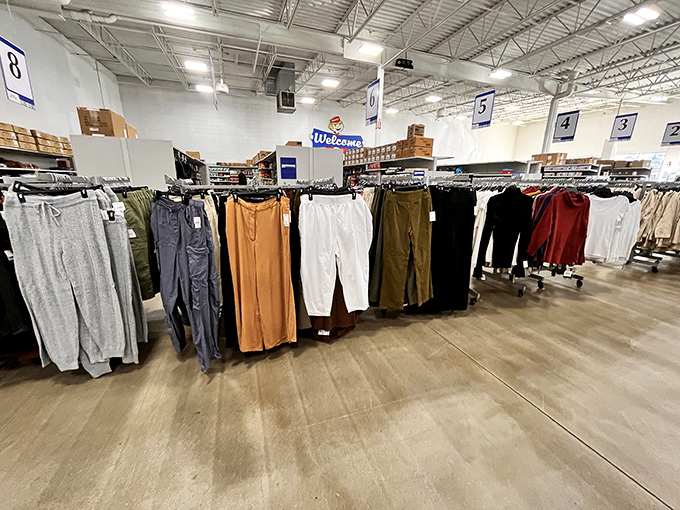 The clothing section: where fashion meets frugality. These pants are arranged with more care than my retirement portfolio.