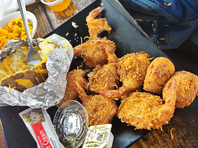 Golden coconut-crusted shrimp that crunch like tiny treasure chests filled with sweet, tender seafood goodness.
