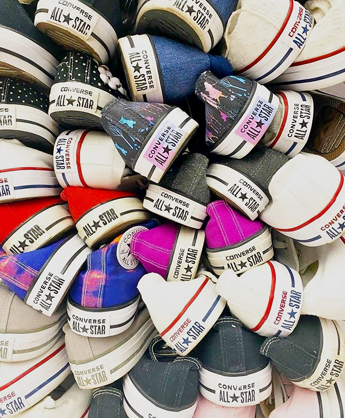 Converse heaven&mdash;a pile of All Stars that could tell a hundred stories, now waiting to walk a mile in your life.