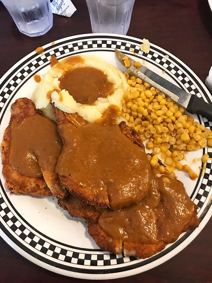 Country fried steak: where a perfectly innocent piece of beef dresses up in crispy coating and takes a luxurious bath in gravy. Resistance is futile.