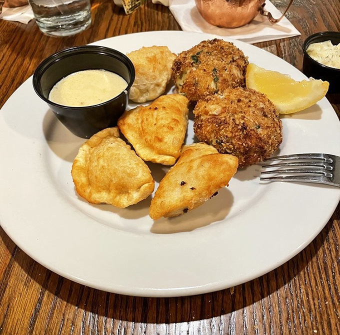 Golden-brown crab cakes that are mostly crab (not filler) paired with savory lobster pie&mdash;a seafood lover's dream team.