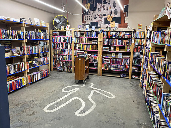 The crime fiction section, where the only thing murdered is your book budget. That chalk outline on the floor is either clever d&eacute;cor or where someone fainted from joy.
