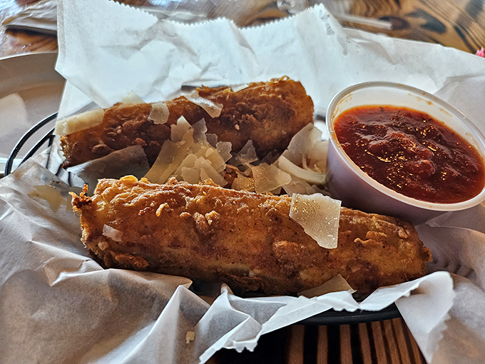 Crispy, golden-brown perfection with a side of tangy sauce&mdash;these morsels might make you temporarily forget you came for steak.