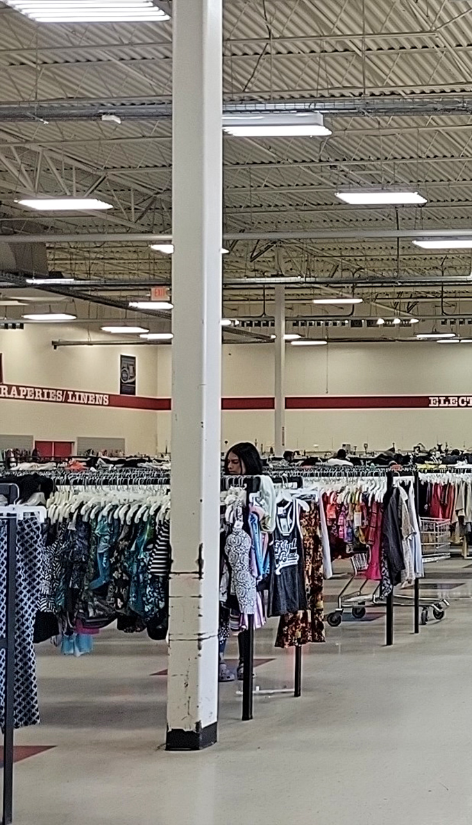 The high ceilings and industrial expanse reveal the true scale of this operation&mdash;less "store" and more "secondhand stadium."