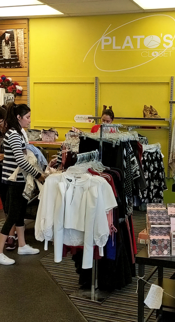 Treasure hunters in their natural habitat, sifting through possibilities while surrounded by a sunshine-yellow wall that radiates affordable optimism.