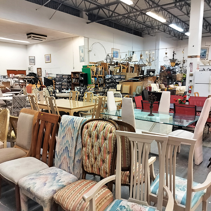 Dining tables and chairs arranged like a fancy furniture showroom, minus the fancy prices. That glass-topped beauty could host your next dinner party.