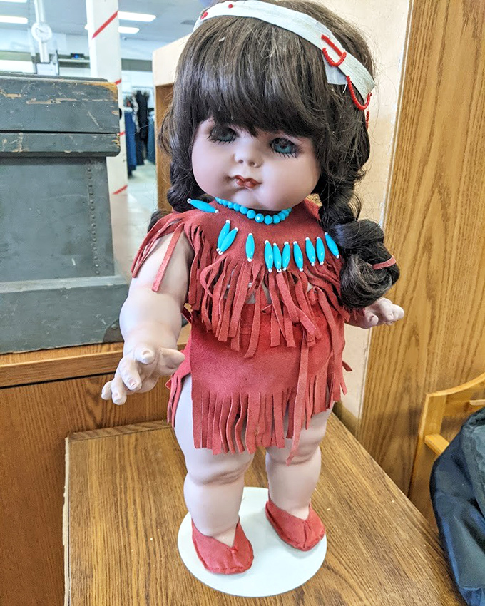 This Native American-styled doll isn't just vintage kitsch&mdash;it's someone's childhood memory waiting for its second act in a new home's display cabinet.